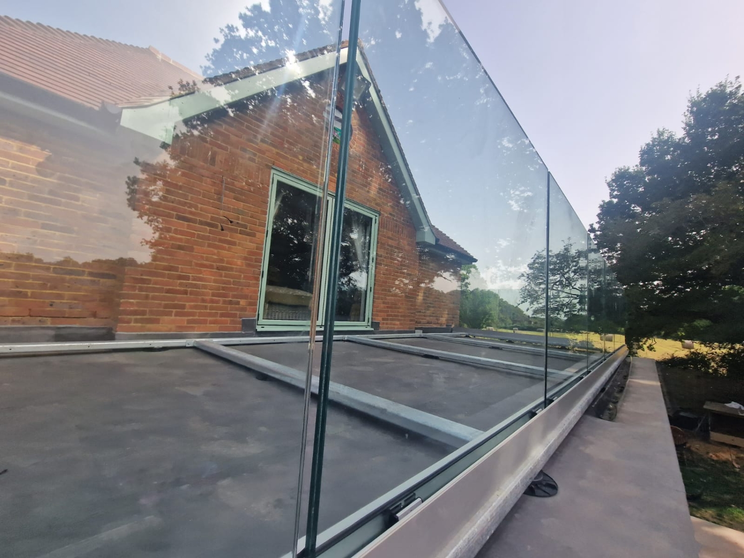 Frameless-Glass-Balustrade-on-flat-roof (2) - Brighton Balustrade ...