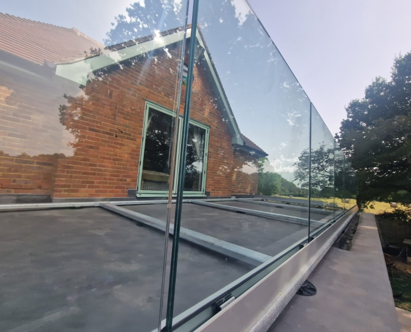 Installation of glass balustrade systems to flat roofs - Brighton ...